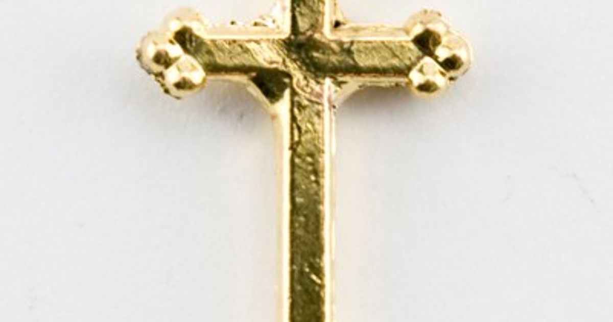 Gold cross pin