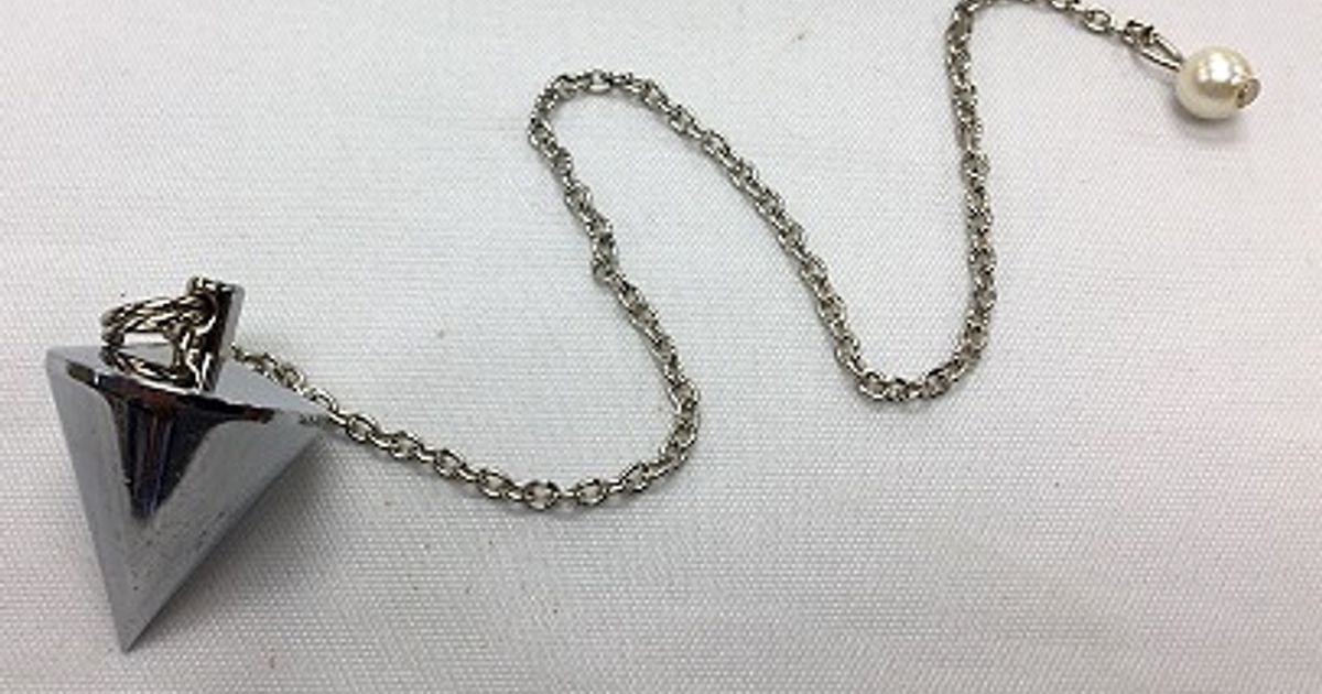 Pendule conique en métal